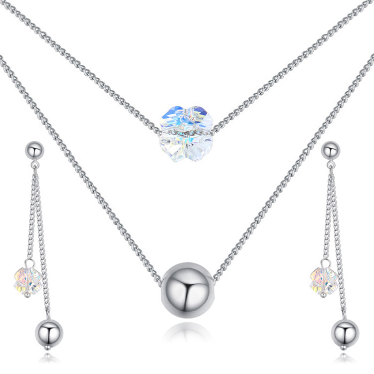 Set Ocean Heart Flores y esferas Cristales tornasol baño de oro blanco 18k